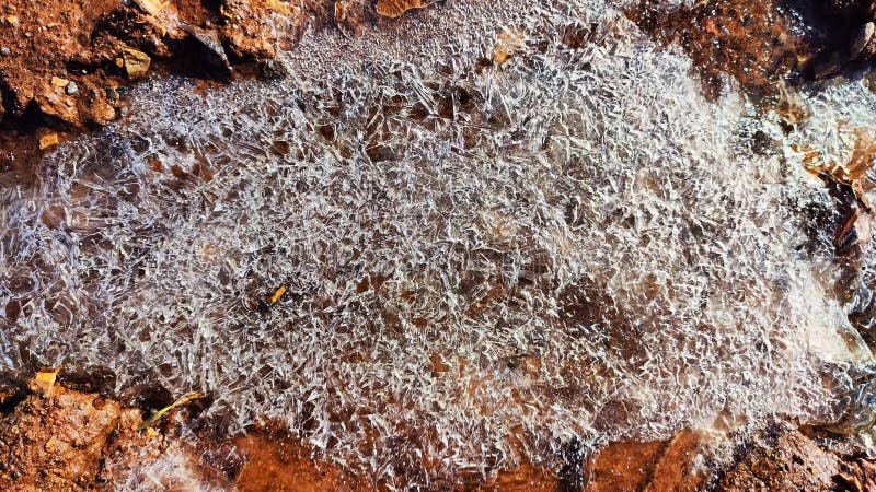 Top View of Ice Puddle. Abstract Background and Texture of Ice Crystals ...