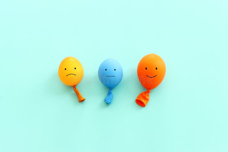 Top View Image Balloons with Happy and Sad Face. Concept of Happiness ...