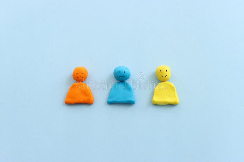 Top View Image of Figures with Happy and Sad Face. Concept of Happiness ...