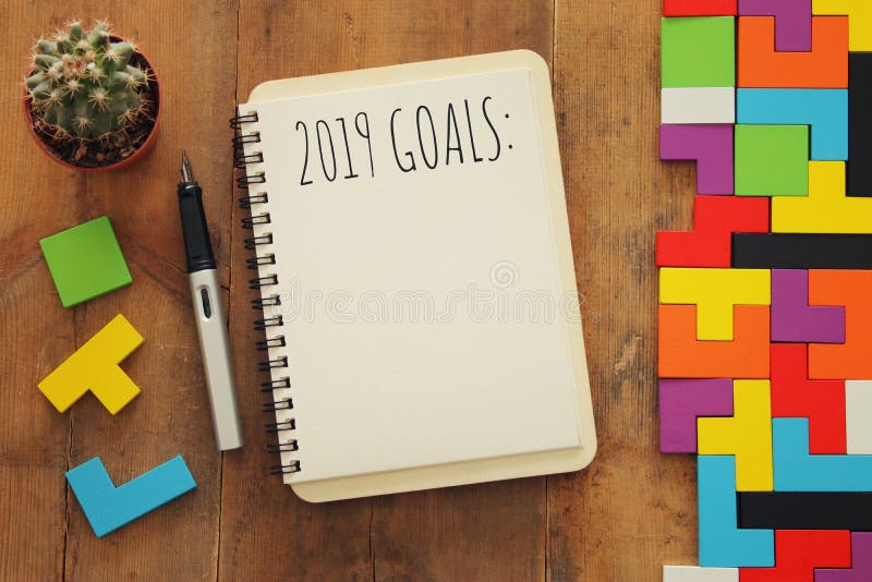 Top View Image of 2019 Goals List with Notebook, Cup of Coffee Over ...