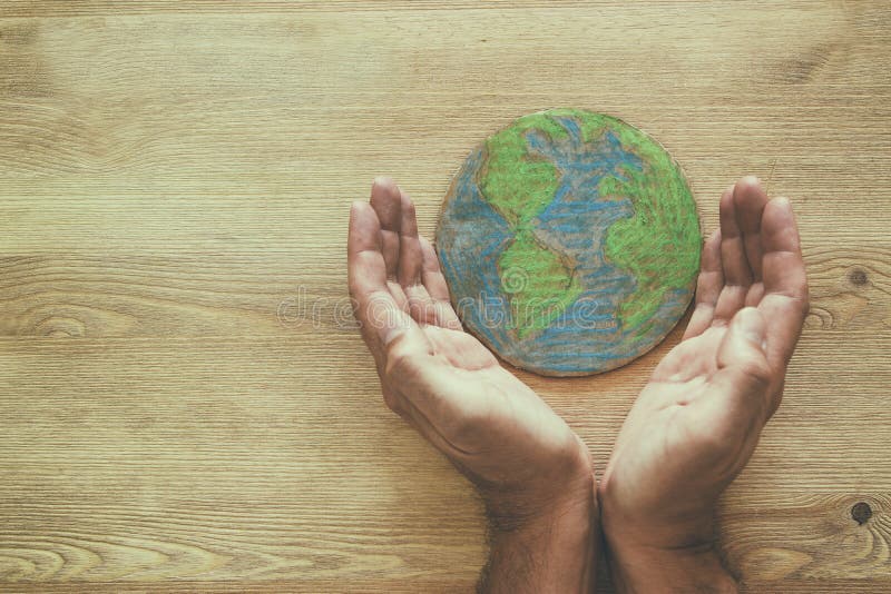 Top View Image of Man Hands Holding Earth Globe Over Wooden Table ...