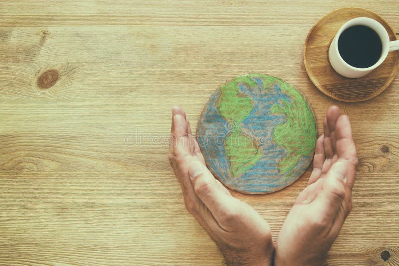 Top View Image of Man Hands Holding Earth Globe Over Wooden Table ...