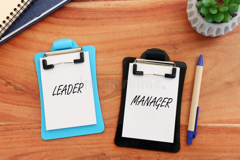 Top View Image of Notes with the Text Leader and Manager. Concept of ...