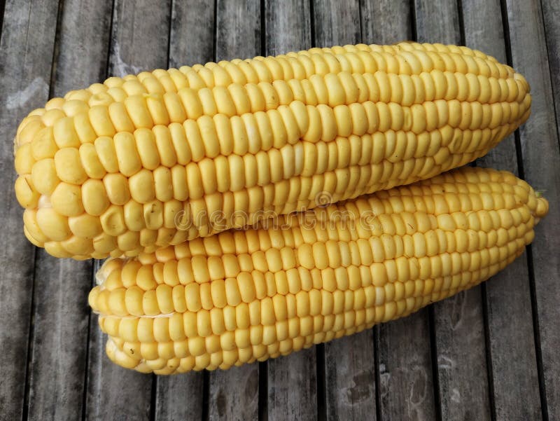 Jumbo Sized of Corn, Full Nutritional Ingredients, on a Bamboo Board ...