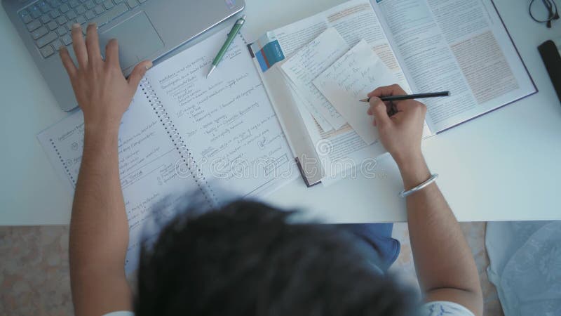 Top View, Indian Student Working on Computer, Preparing for Exam Stock ...