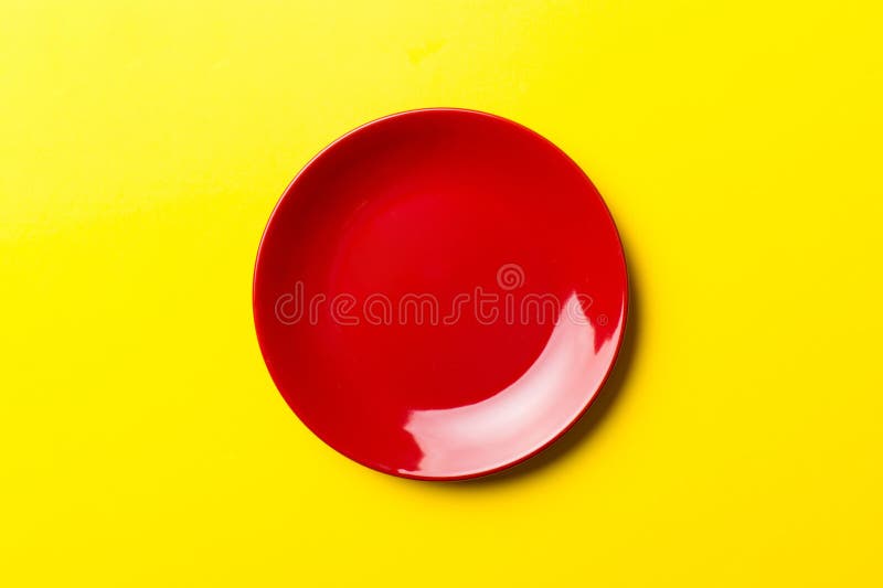 Top View of Isolated of Colored Background Empty Round Red Plate for ...