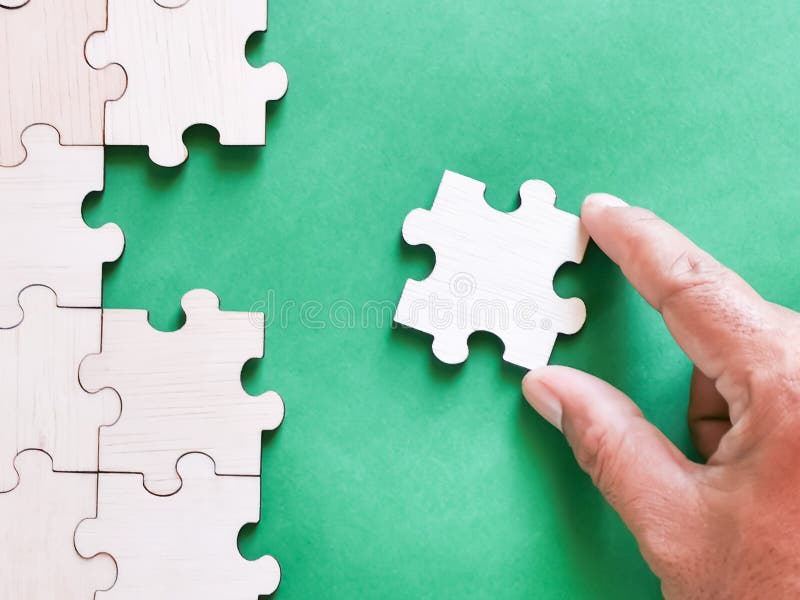 Top View Jigsaw Puzzle Isolated on Green Background. Stock Image ...