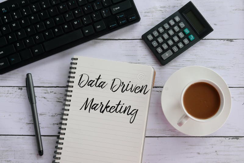 Top View of Keyboard,calculator,coffee,pen and Notebook Written with ...