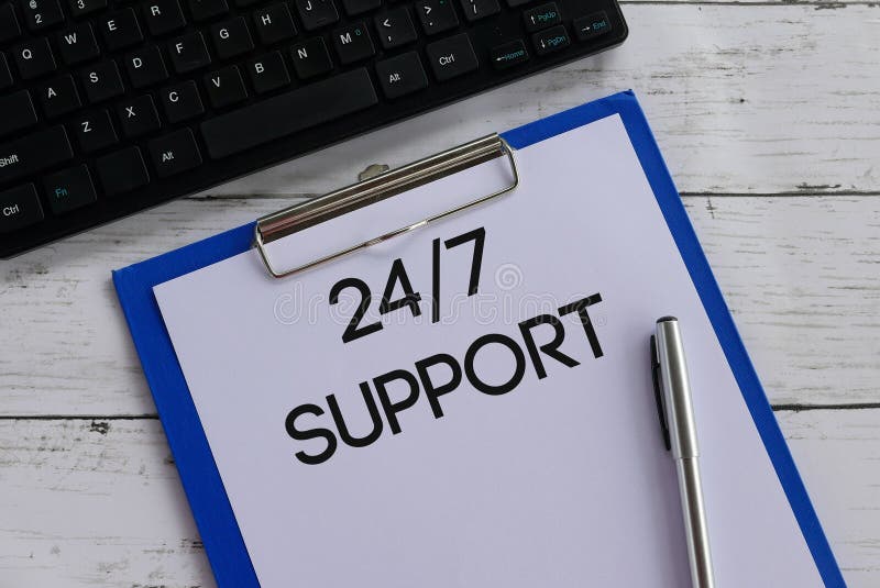 Top View of Keyboard,pen,clipboard and Paper Written with 24/7 Support ...