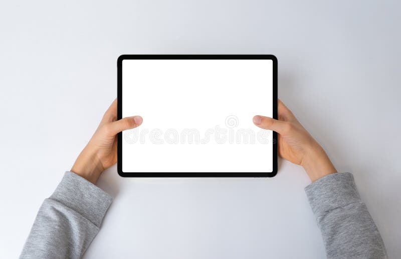 Top View of a Kid S Hands Holding a Horizontal Tablet on a Desk. Flat ...
