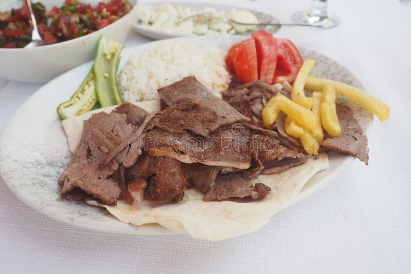 Top View of Lamb Doner Kebab, Rice and Chips on a Plate Stock Photo ...