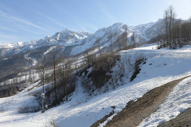 Landscape of Deep Gorges and High Mountains with Snow-capped Peaks ...