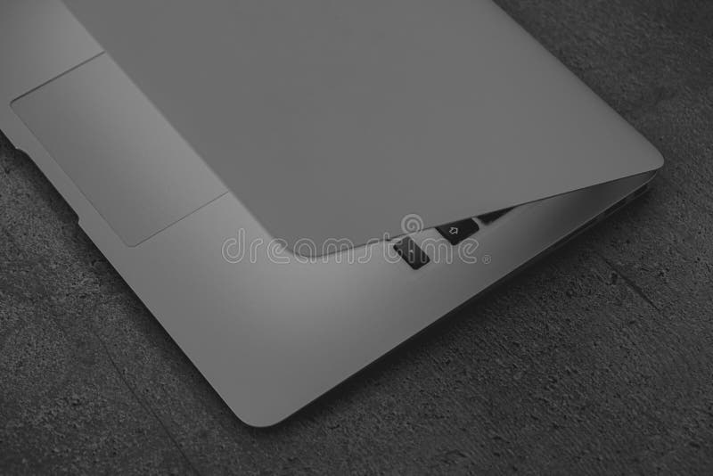 Top View of a Laptop with Closed Lid on an Office Table, Low Light ...