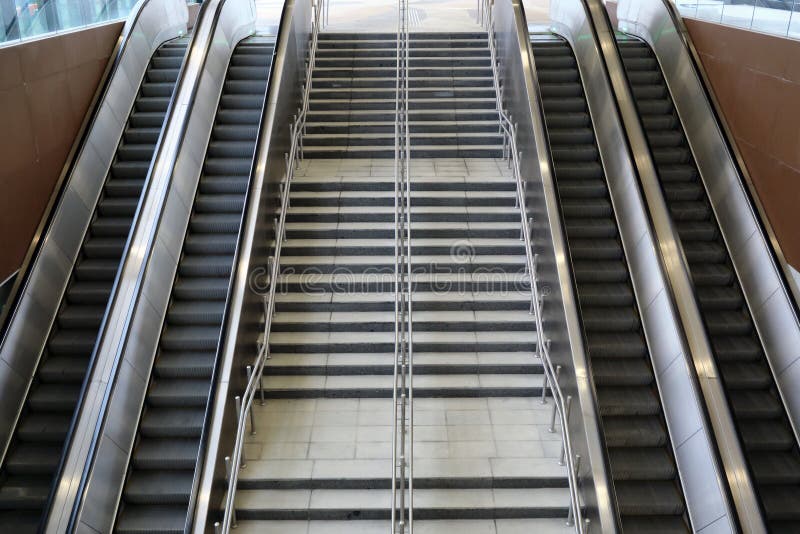 Top View of a Large Multi-level Escalator and Pedestrian Staircase ...