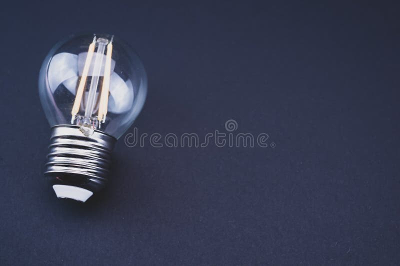 Top View of the Light Bulb on the Black Surface Stock Image - Image of ...