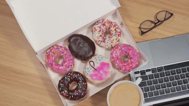 Top View Like People Take Donuts Out of the Box on a Table Stock Video ...