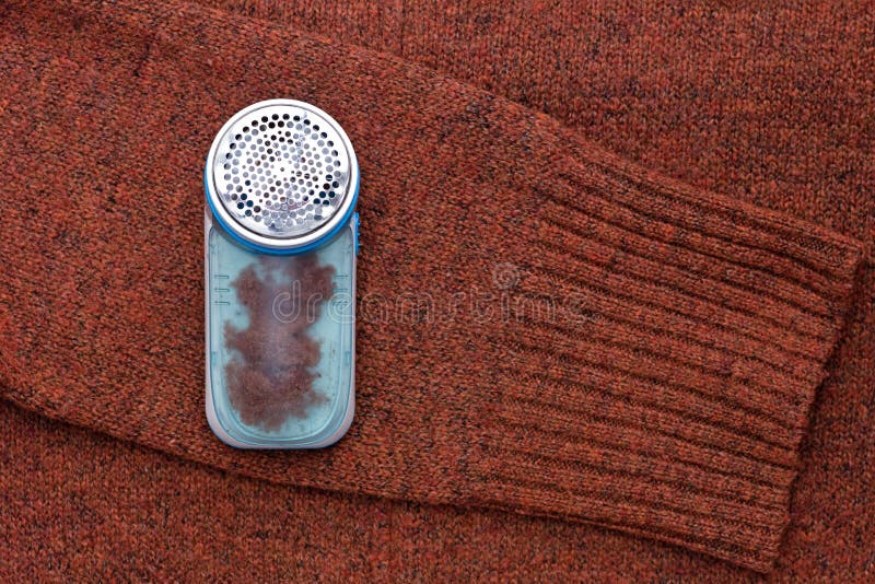 Lint Remover with Bin Full of Cutted Lint Stock Photo - Image of cutted ...