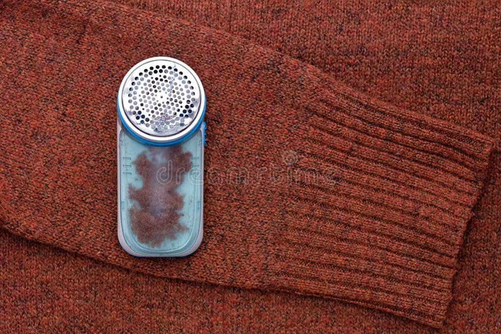 Lint Remover with Bin Full of Cutted Lint Stock Photo - Image of cutted ...