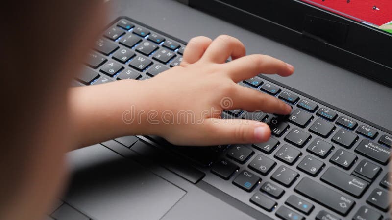 Top View of Little Boy Typing and Drawing on Latop Keyboard. Child ...