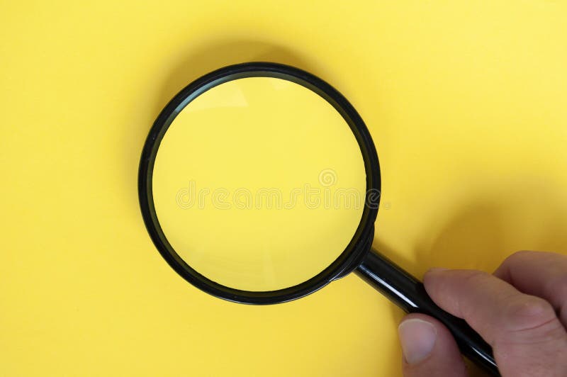 Top View of Magnifying Glass on Yellow Background with Customizable ...