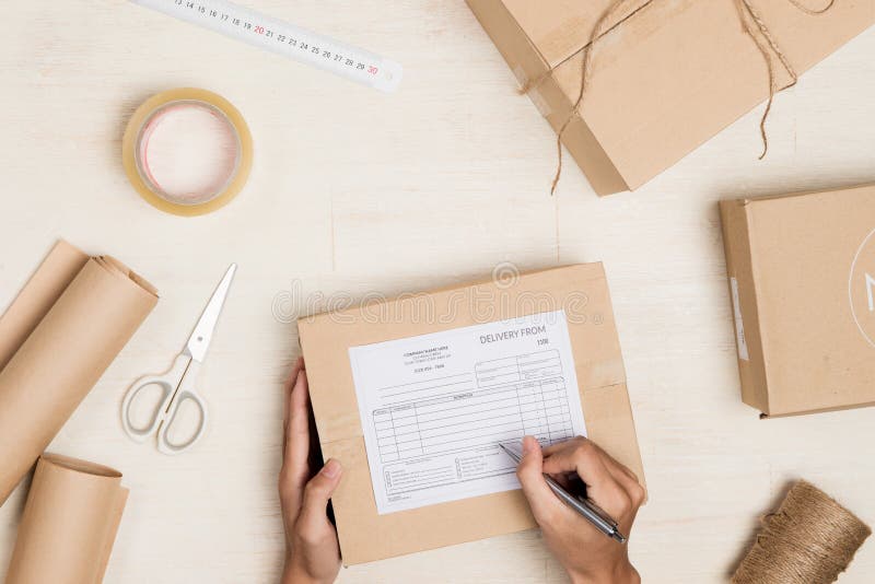 Delivery Receipt on Cardboard Box at Table Stock Image - Image of ...