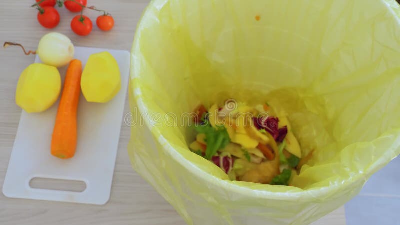 Top View of a Man Composting Vegetable Waste in the Kitchen Stock ...