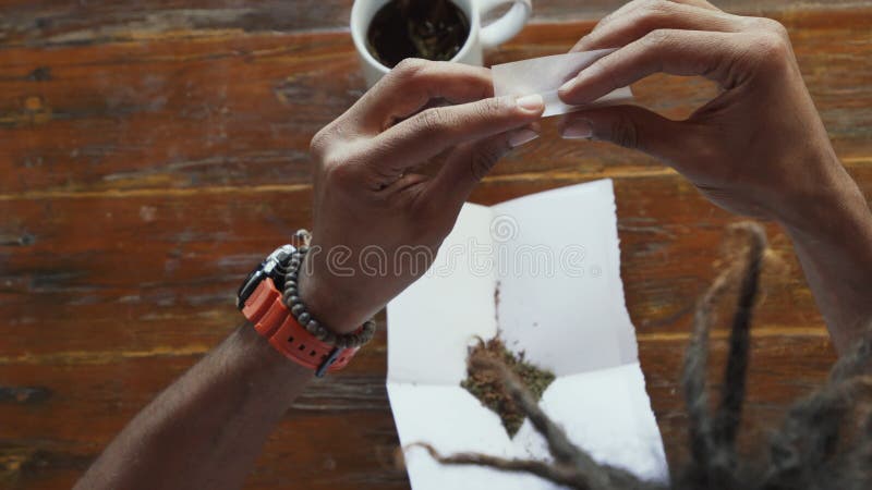 Top View Man with Dreadlocks Rolling Marijuana Joint Stock Image ...
