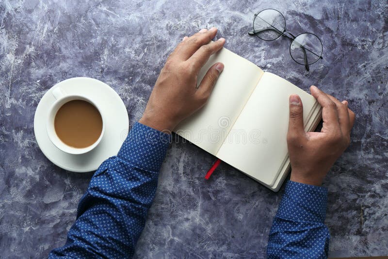 Top View of Man Hand on Diary and Tea on Table Stock Image - Image of ...