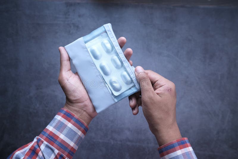 Top View of Man Hand Holding Blister Pack Stock Photo - Image of care ...