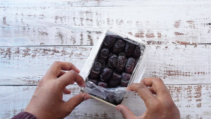 Top View of Man Hand Pick Date Fruit from a Box Stock Footage - Video ...
