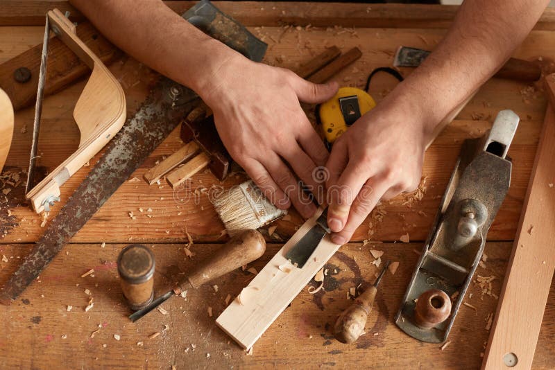 Top View of Man Hand Using Chisel on Wooden Table, Working among the ...