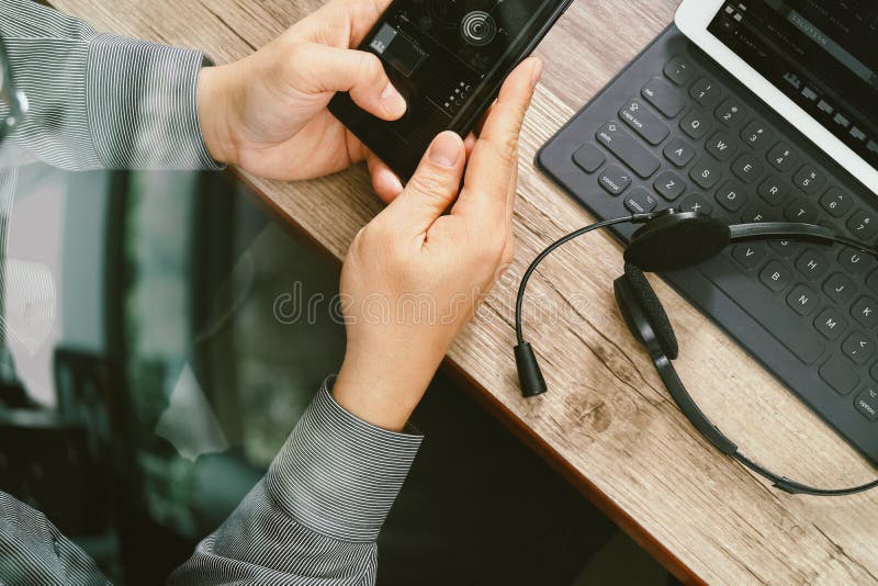 Top View of Man Hand Using VOIP Headset with Digital Tablet Comp Stock ...
