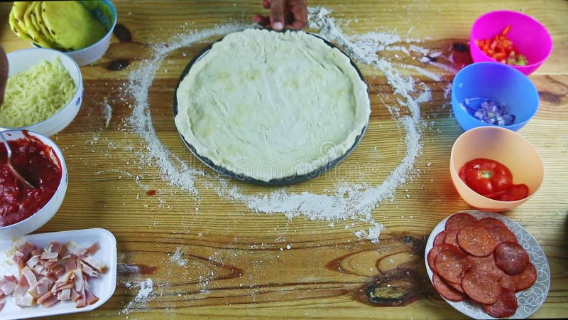 Top View of the Pizza on the Table. Hands Disassemble Slices of Pizza ...