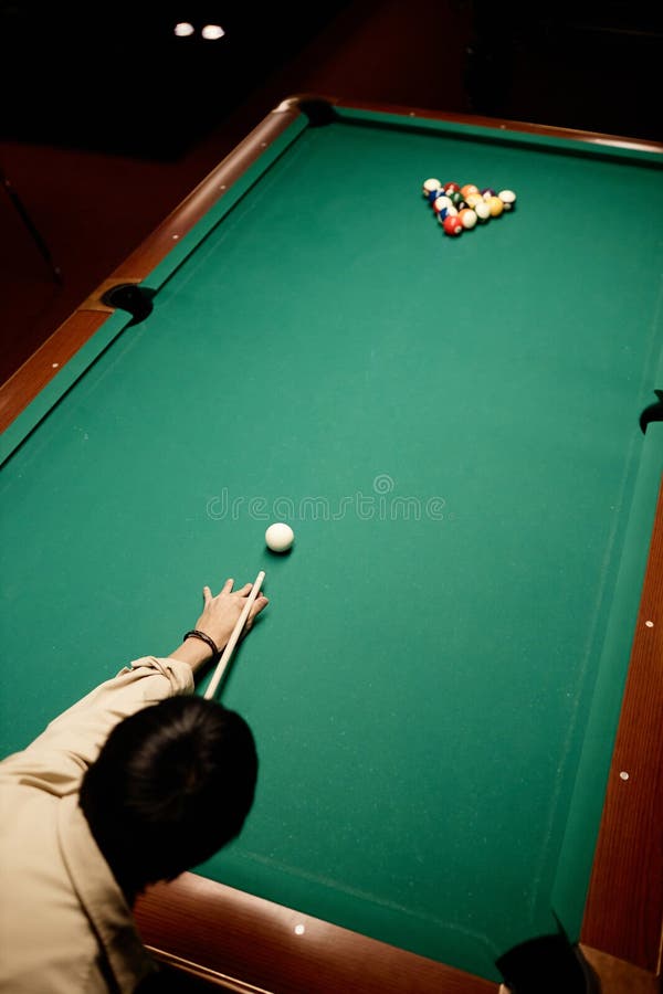 Top View of Man Playing Pool at Table Nd Hitting Ball with Cue Stick ...