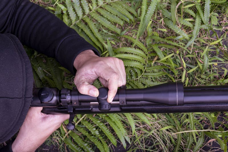 Top View Man with a Rifle on Grass Floor Stock Photo - Image of camera ...