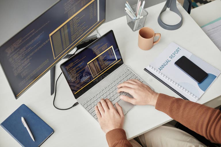 Top View Man Typing On Computer Keyboard And Writing Code Stock Image