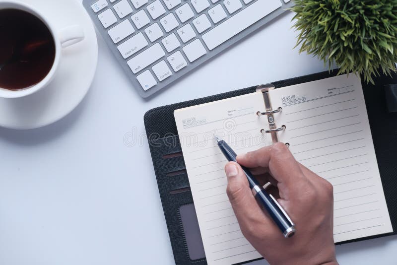 Top View of Man Writing on Notepad Stock Photo - Image of hand, office ...