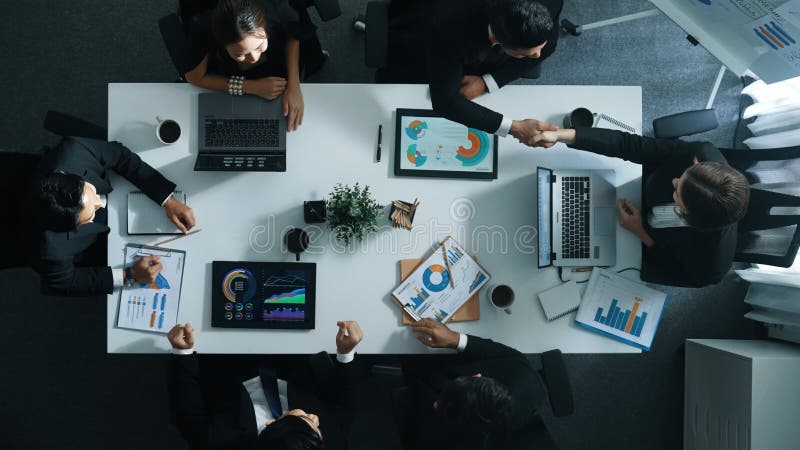 Top View of Manager Present Growth Graph while Team Shaking Hand ...