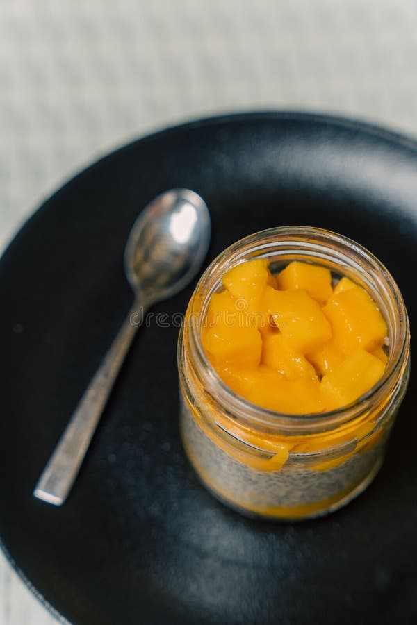 Top View of a Mango Jam on a Black Plate. Stock Image - Image of view ...