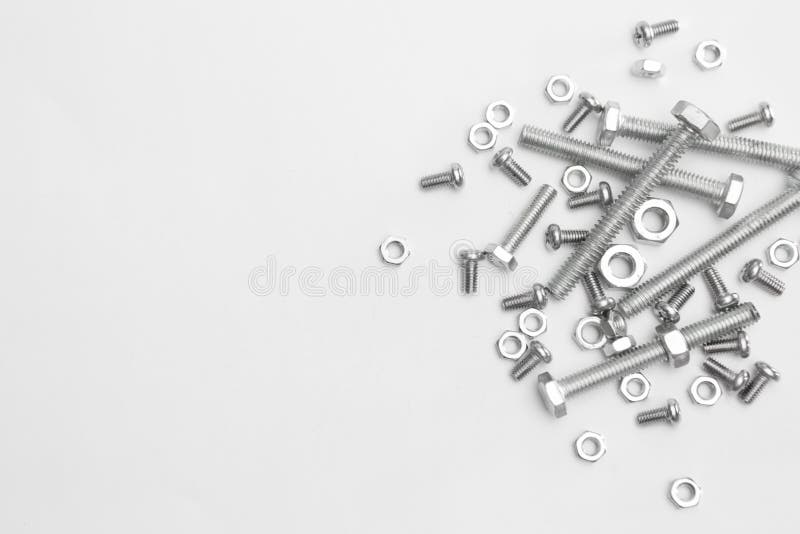 Top View of Many Nuts and Bolts on White Background Stock Image - Image ...