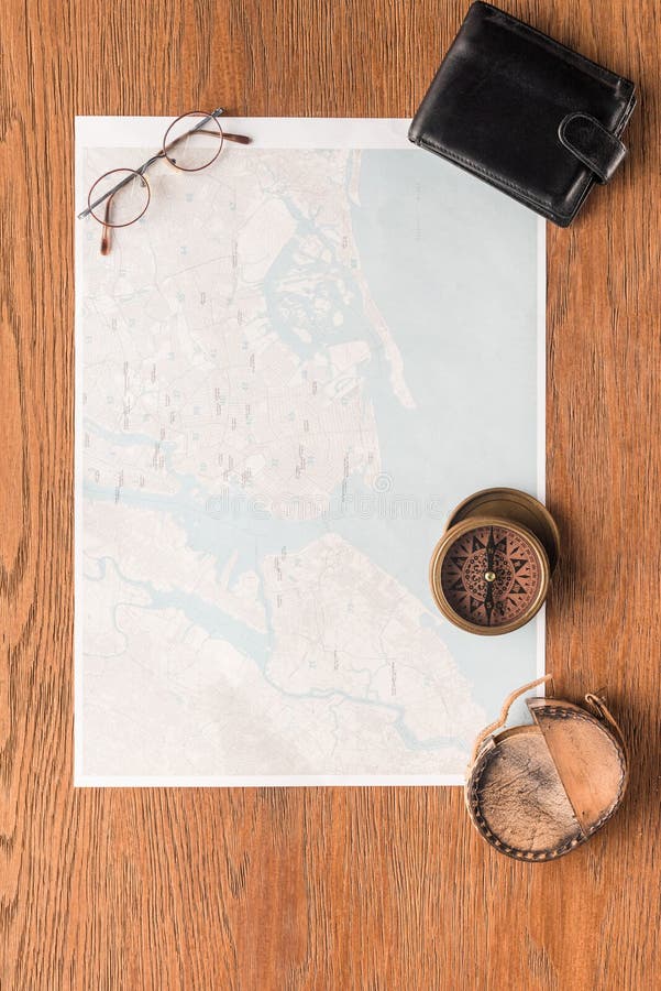 Top View of Map with Wallet, Eyeglasses and Compass Stock Photo - Image ...