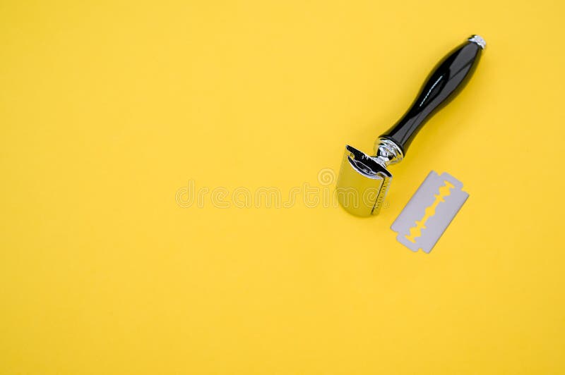 Top View of a Mechanical Razor and Blade Isolated on Yellow Background ...