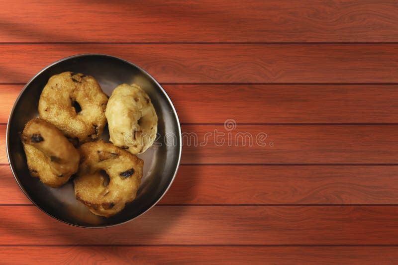 Top View of Medu Vada in a Bowl on a Wooden Background Stock Photo ...