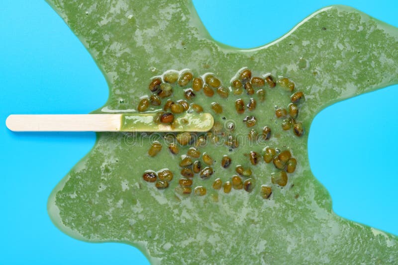 Melted Mung Bean Popsicle on a Blue Background Stock Image - Image of ...