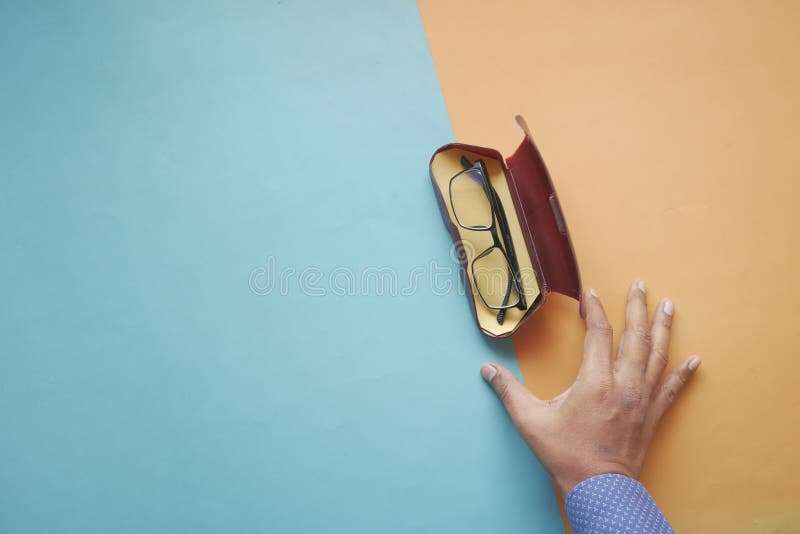 Top View of Men Hand Reaching for His Eyeglass Stock Photo - Image of ...