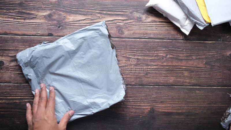 Top View of Men Open Delivery Package on Table Stock Footage - Video of ...