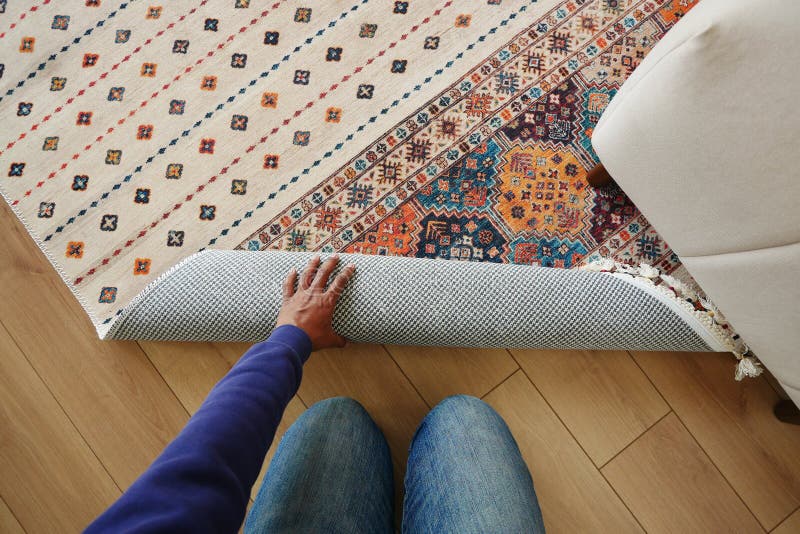 Top View of Men Rolling Out New Rug. Stock Image - Image of positioning ...