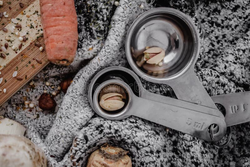 Top View of a Messy Kitchen Table with Herbs, Spices and Measuring ...