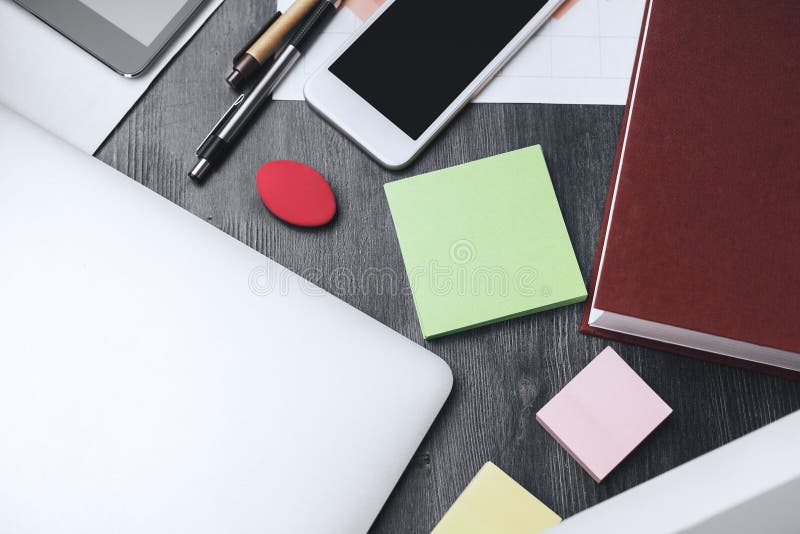 Messy office table stock image. Image of gadget, notepad - 111243243
