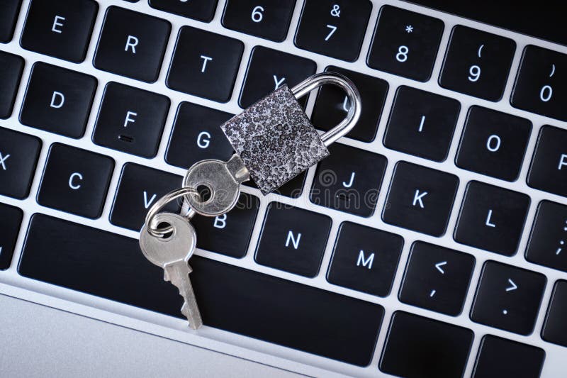 Top View of a Metal Lock and Keys Lying on the Laptop Keyboard Stock ...